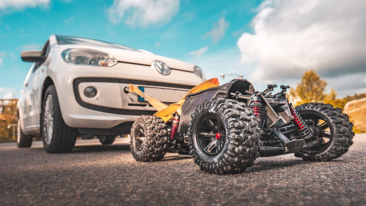 Trying to pull a REAL CAR with an RC Car & Breaking a $1300 LENS - YouTube
