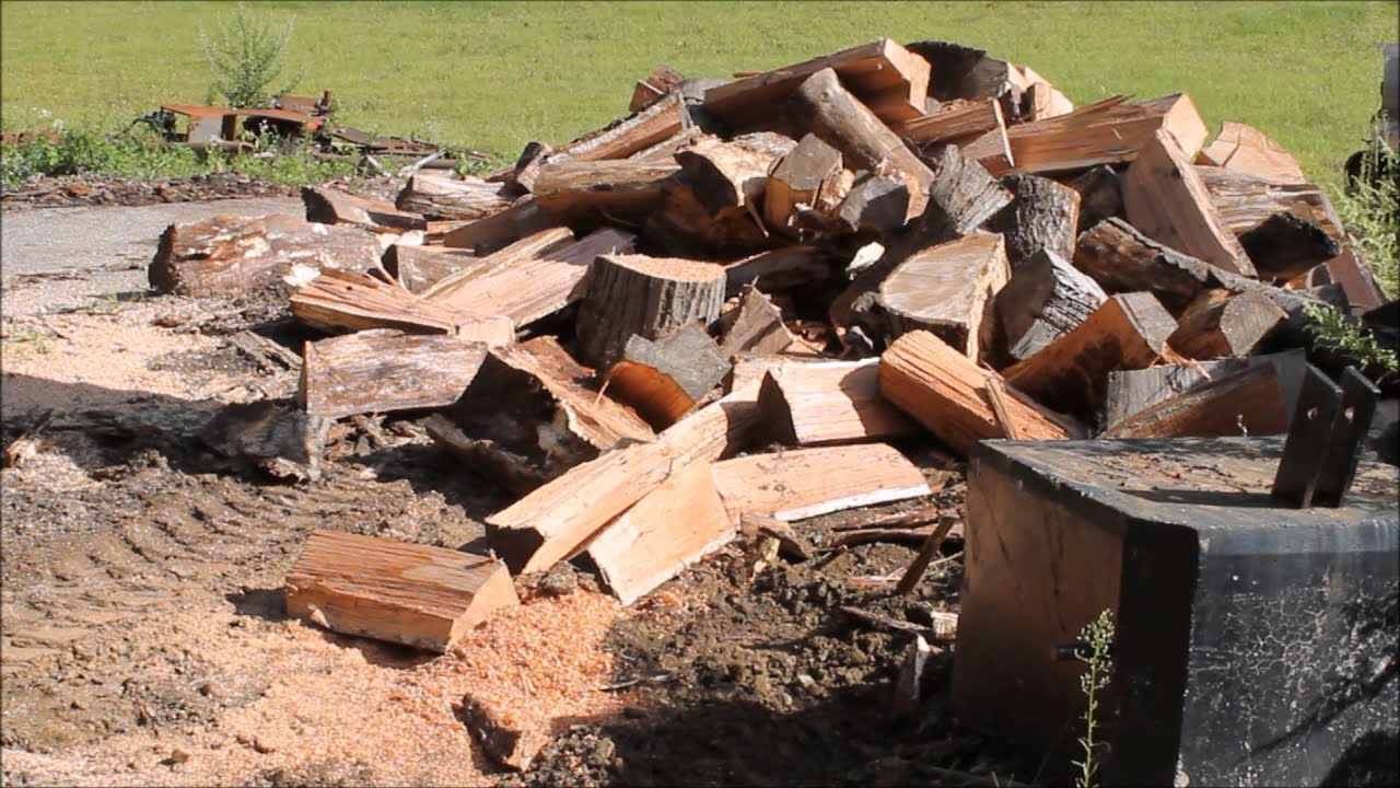 Mini excavator mounted wood splitter - YouTube