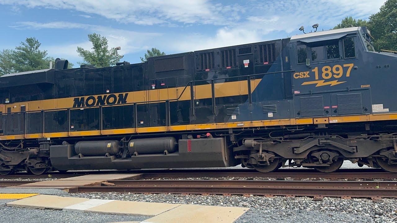 CSX 1897 Heritage unit leads a manifest past Point of Rocks station on ...