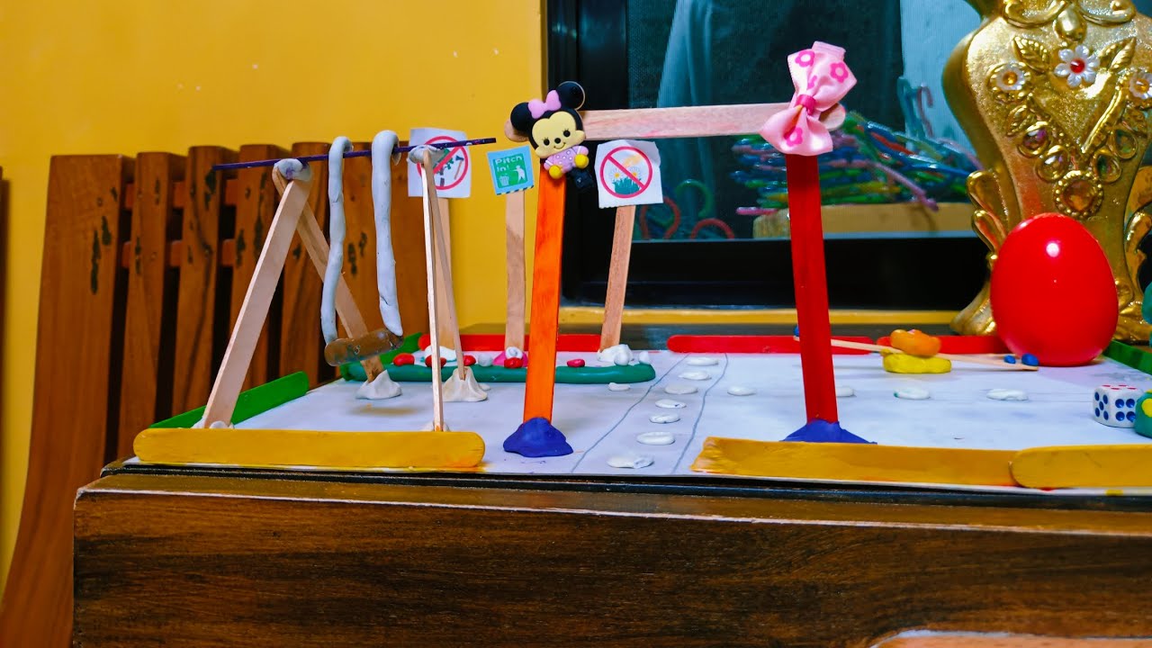 introducing to you my mini park made of popsicle stick and clay it's a ...