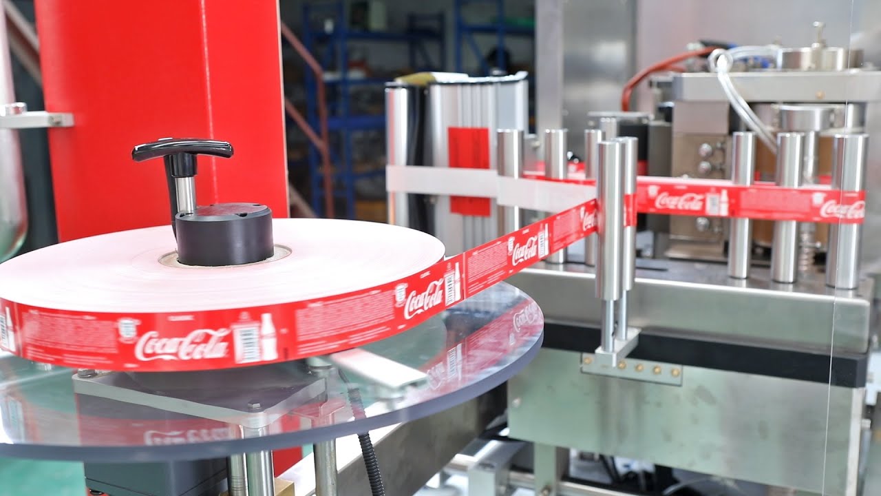 Coca Cola glass bottles HOT-MELT modular labelling machine - YouTube