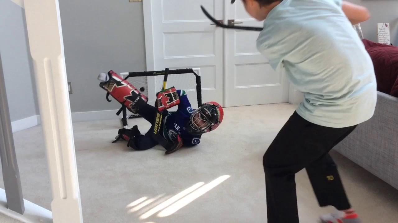 Playing mini sticks with brother - YouTube