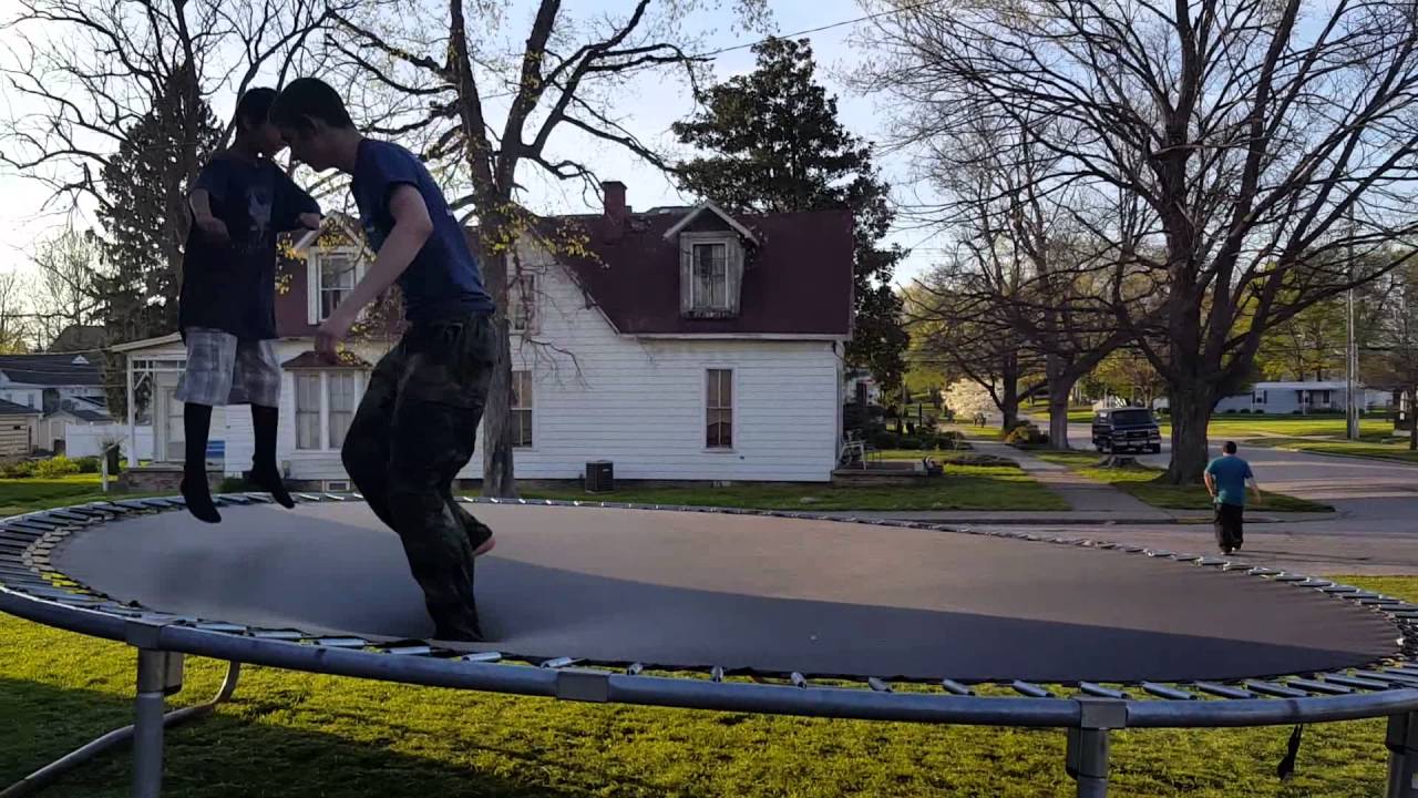 Kid almost falls off trampoline - YouTube
