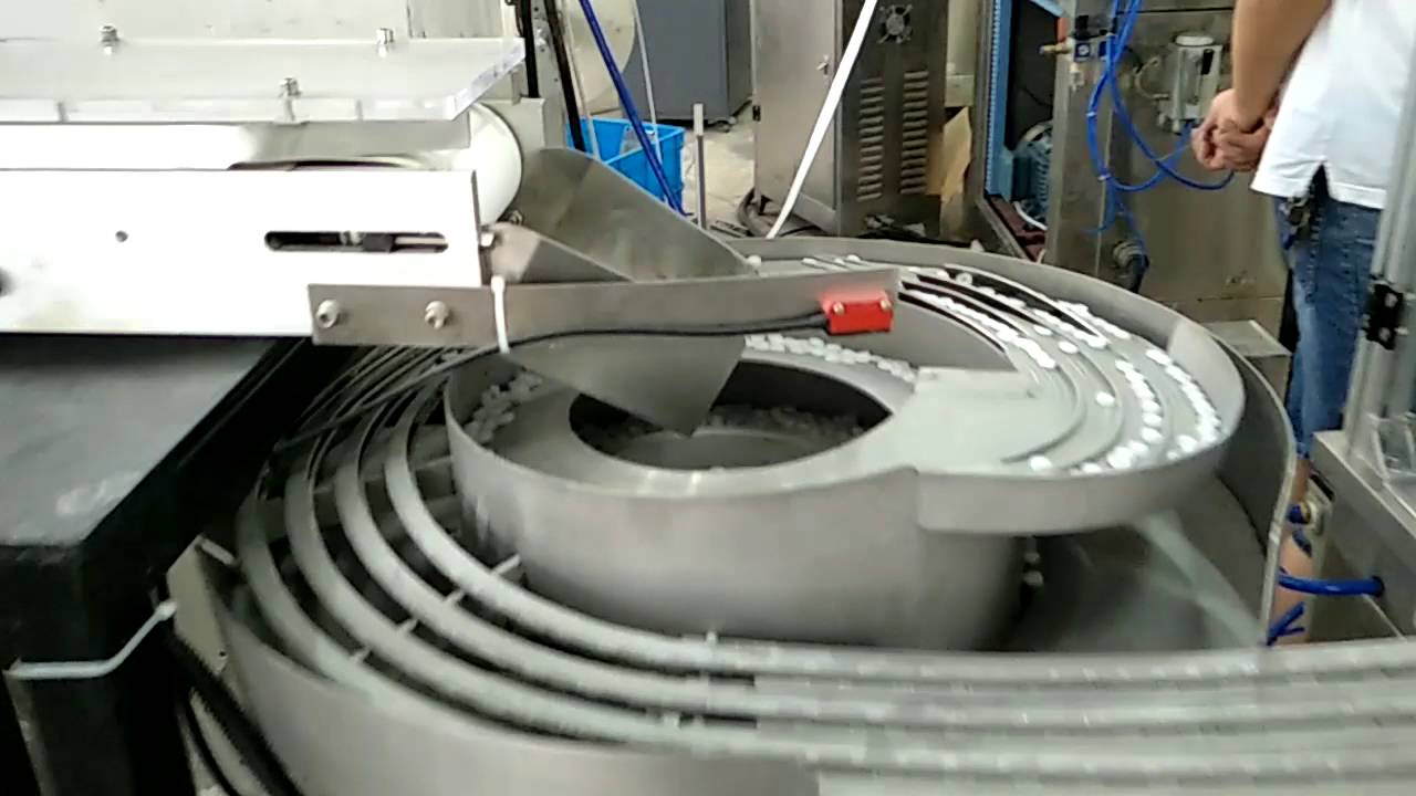 3 parts silicon valve pump cap assembly machine - YouTube