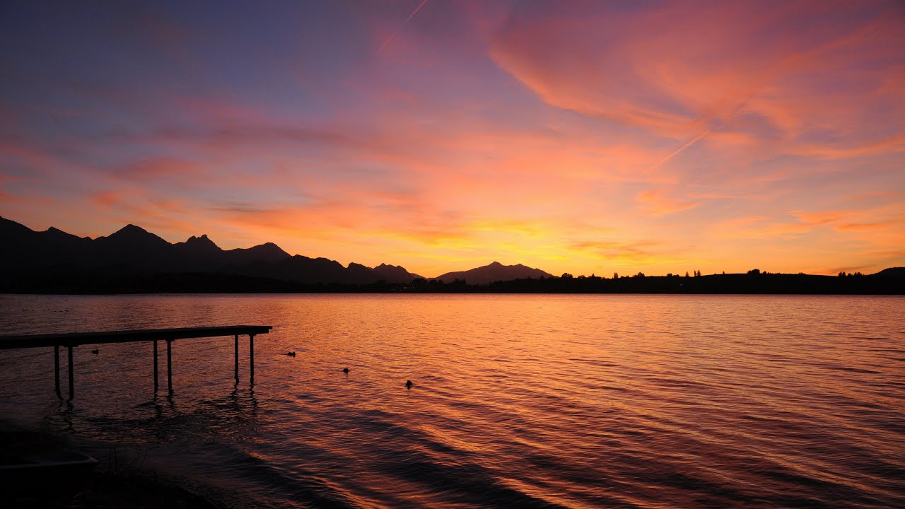 Sonnenuntergang mit Abendrot am Forggensee – Zeitraffer vom 20.09.2019 ...