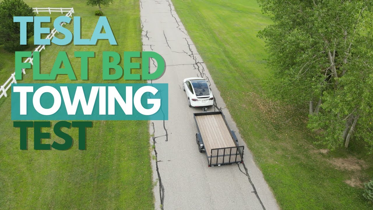 TESLA TOWING A FLATBED WITH A TESLA | EV TOWING - YouTube