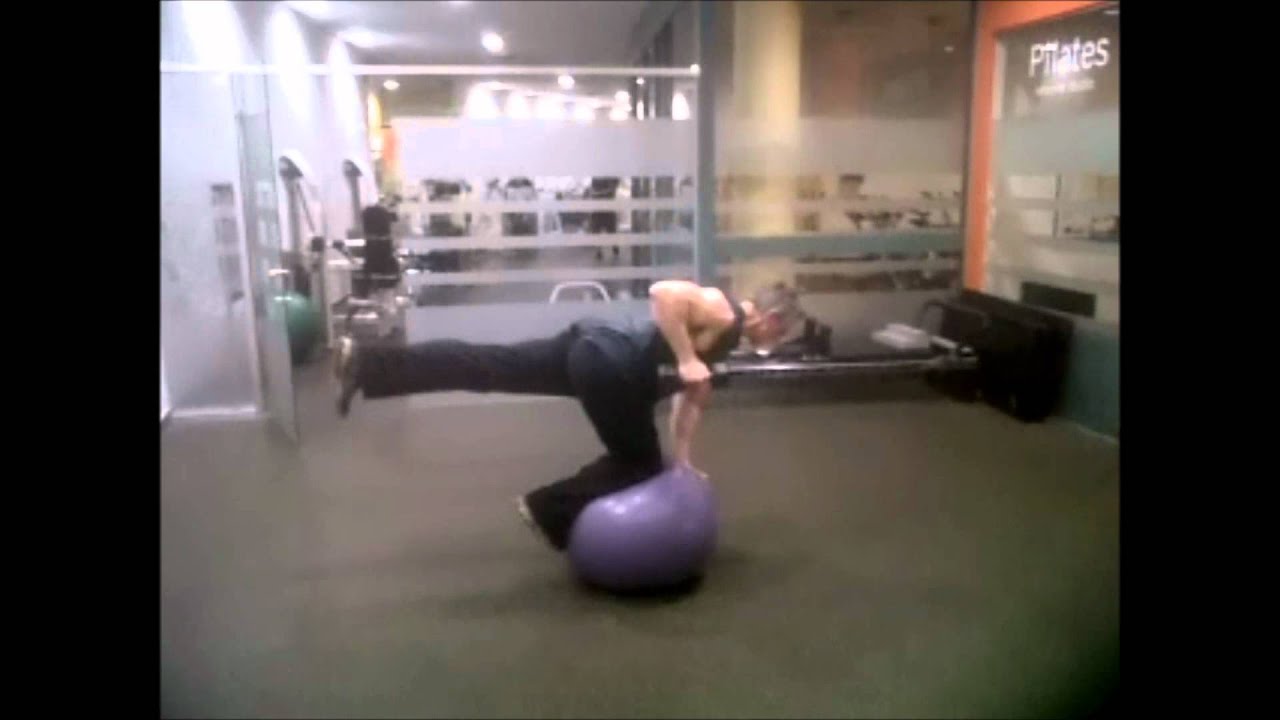 1 arm row on stability ball.wmv - YouTube