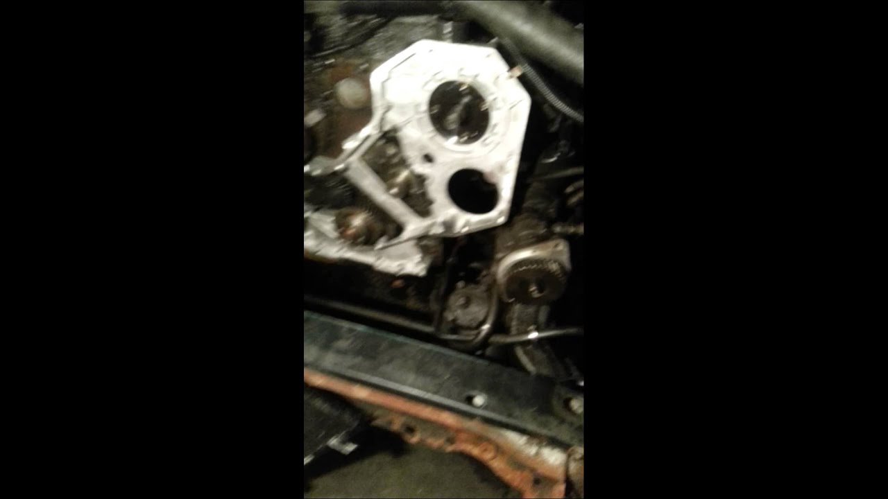 Changing a timing housing on a 12v cummins part 2 - YouTube