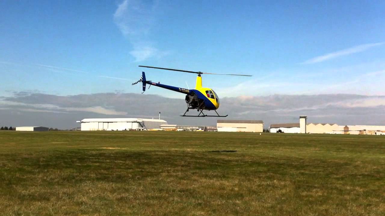 Robinson R22 helicopter solo approach and landing. - YouTube