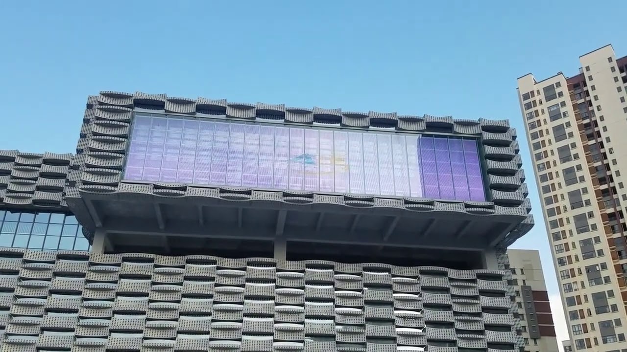 Transparent LED Display on high Glass Facade - YouTube