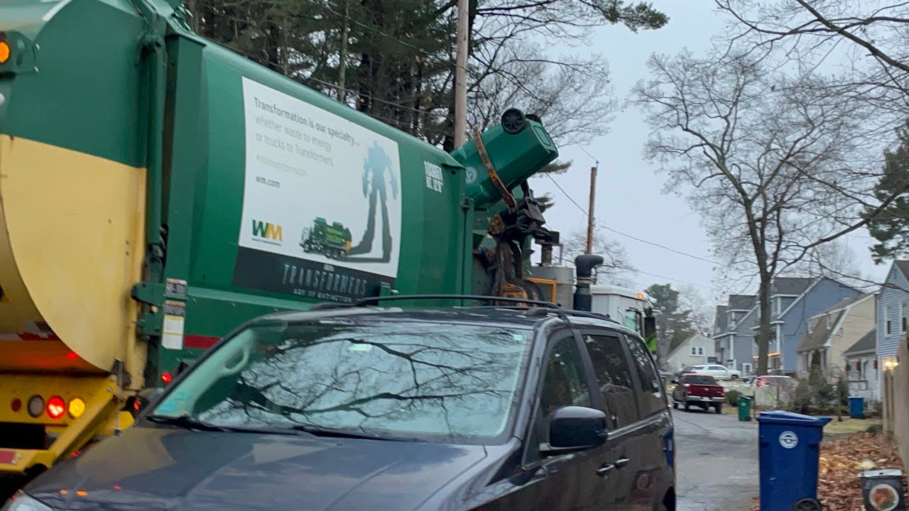 Waste management Labrie Automizer truck 103651 slamming recycling cans ...