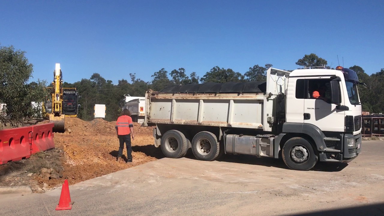 Road base in driveway - YouTube