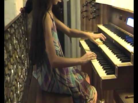 My students Clarita and Talin are playing organ on school's festival