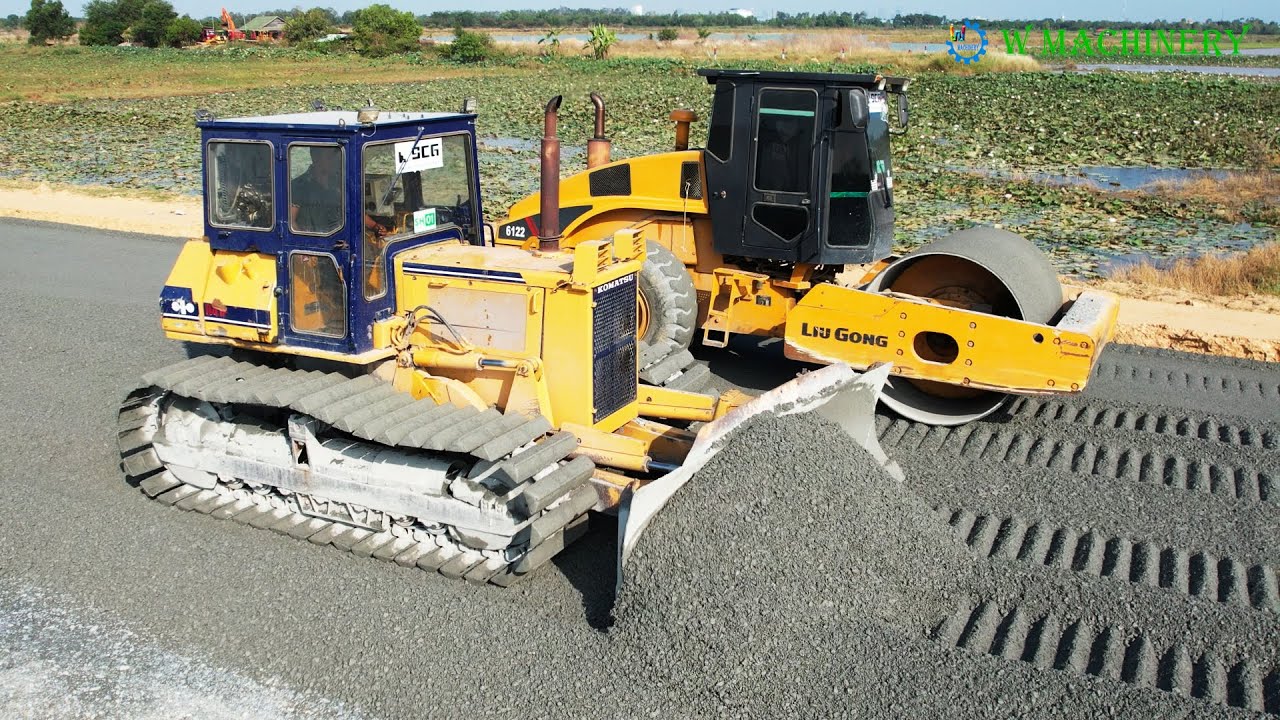 Nice Showing Komatsu Dozer Spreading Gravel Making New Road And Roller ...