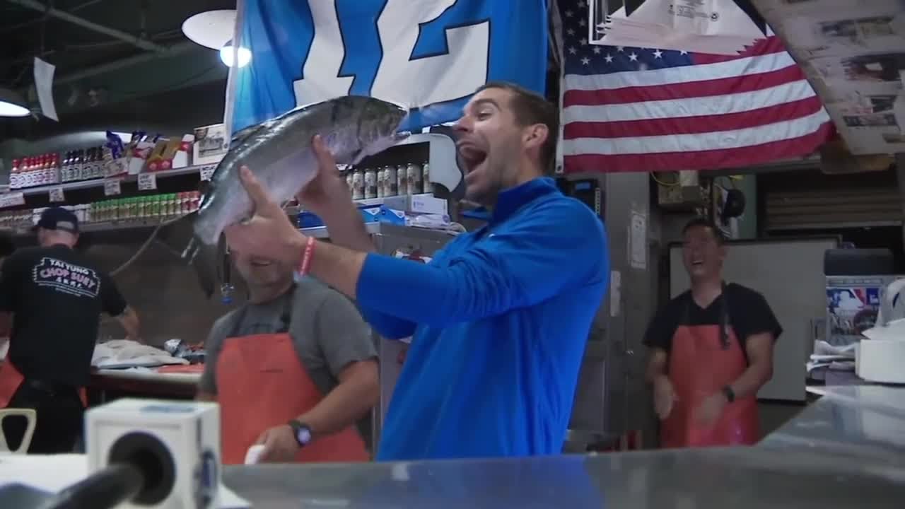 What a catch! Watch our reporter's sweet grab at a Seattle fish market ...