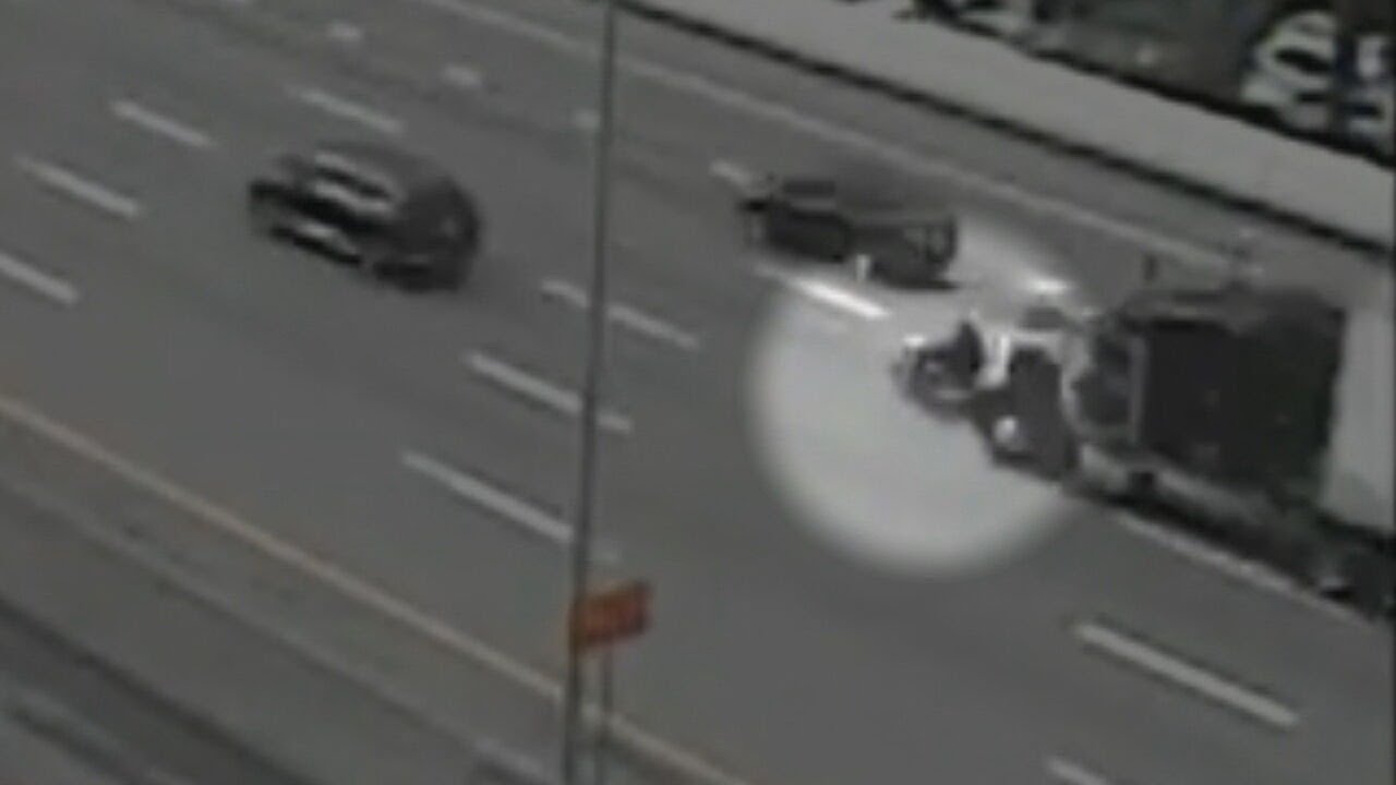 Motorcyclist saved by a stranger after being run over by semi truck in ...