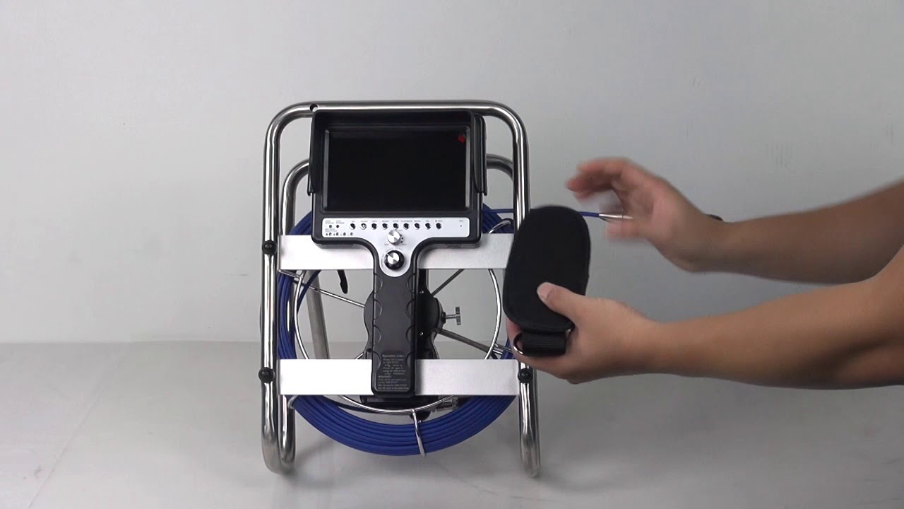 Stand-up pipe inspection camera in blue cable and black handheld ...