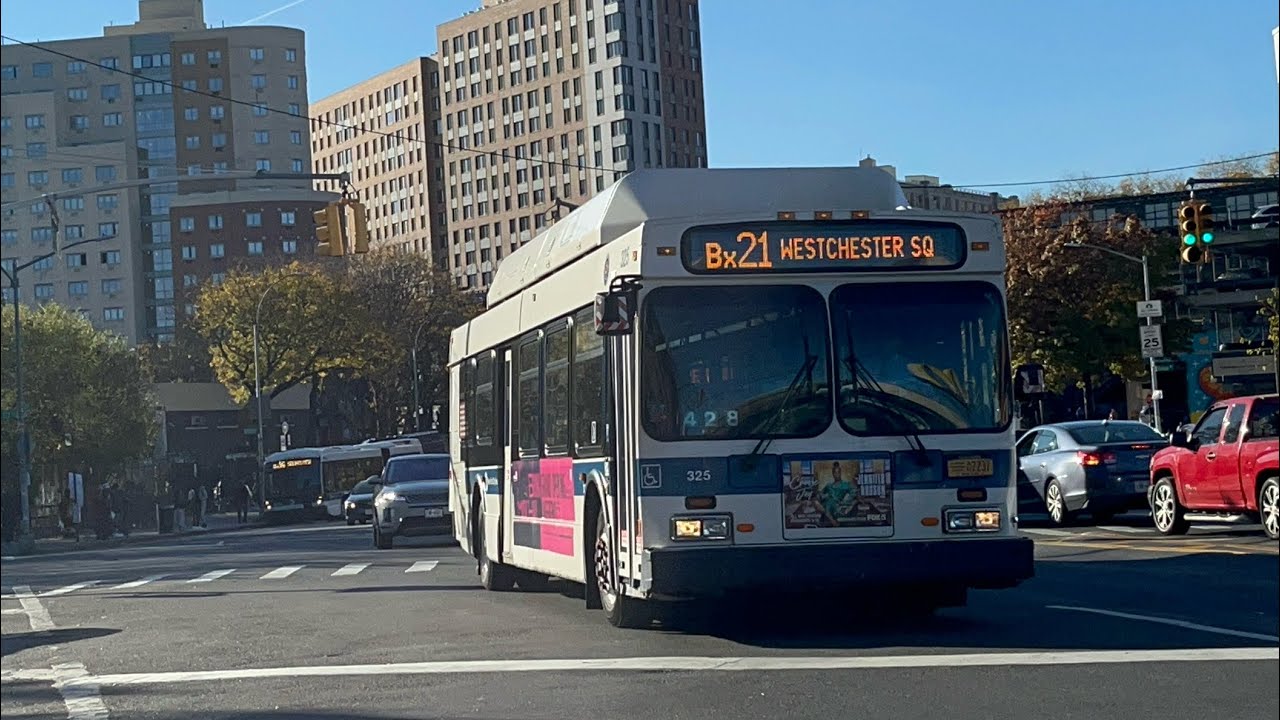 MTA NYCT: 2012 NFI C40LF #325 on the Bx21 passing Devoe Av/E Tremont Av ...
