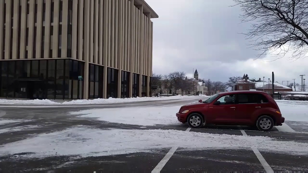 High winds and snow drifts in Downtown Muskegon - YouTube