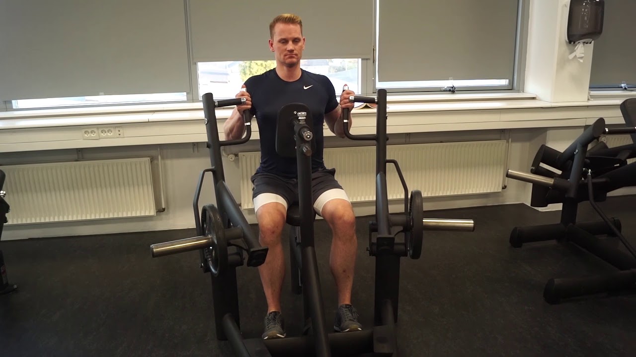 Seated machine row plate load - YouTube