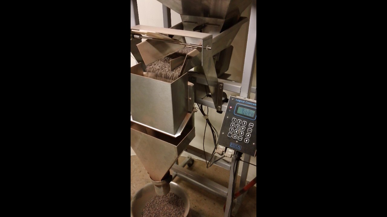 The Logical Machines Model S-4 Automatic Scale System filling 8oz Cocoa ...