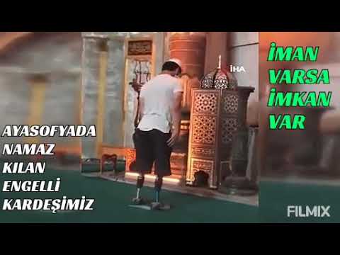 protez bacakları ile namaz kılan çocuk!