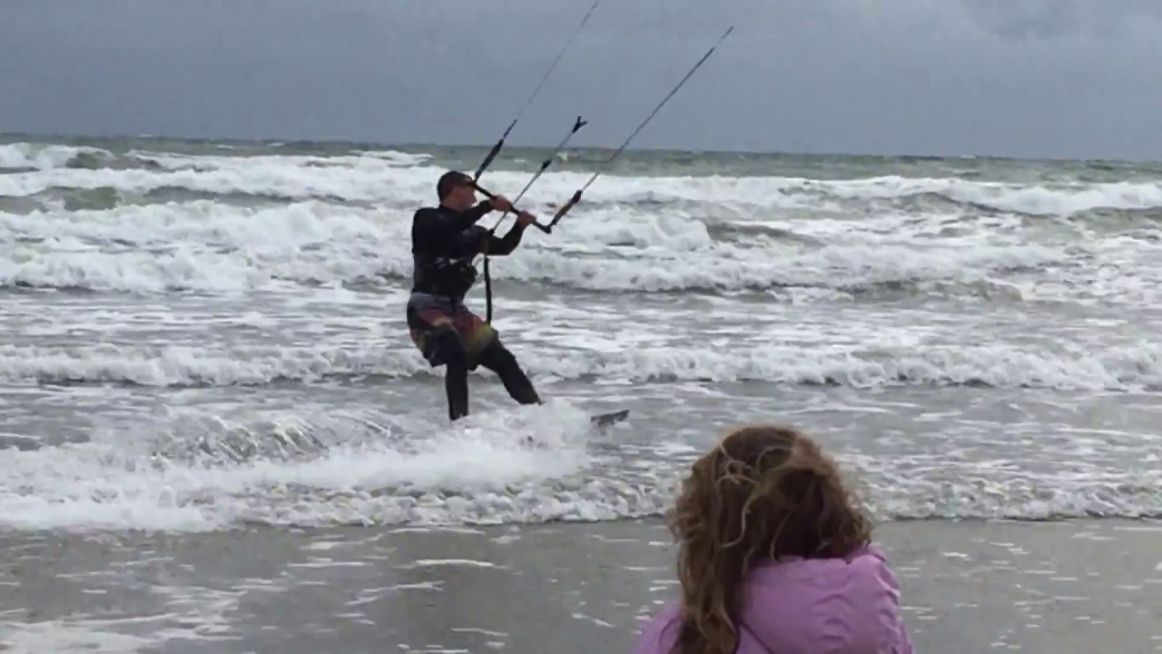 Kite surfer surfing on Pembrey beach wales - YouTube
