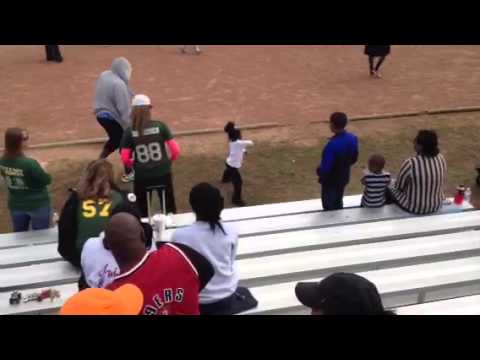 Little girl dancing in a football game - YouTube