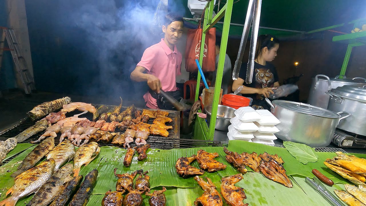 A small street food booth with mixed dishes provides good income for a ...