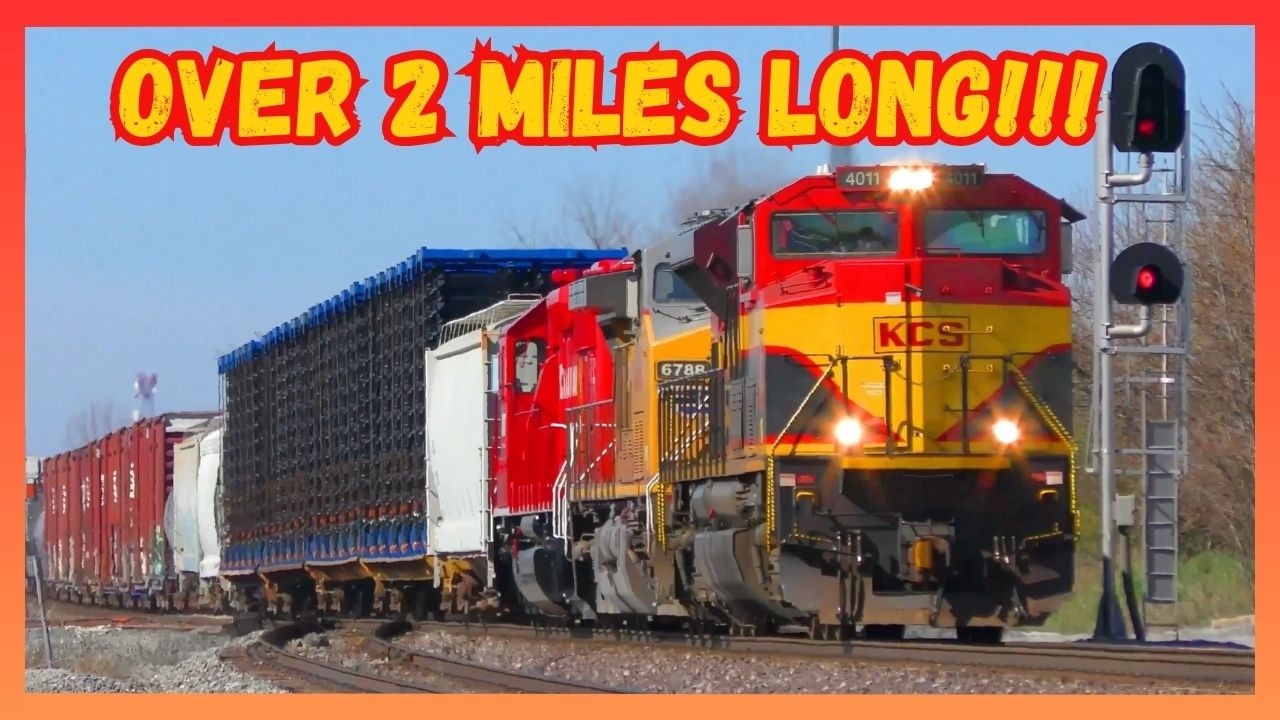 Five locomotives pull train over 2 miles long and 654 axles two DPUs ...