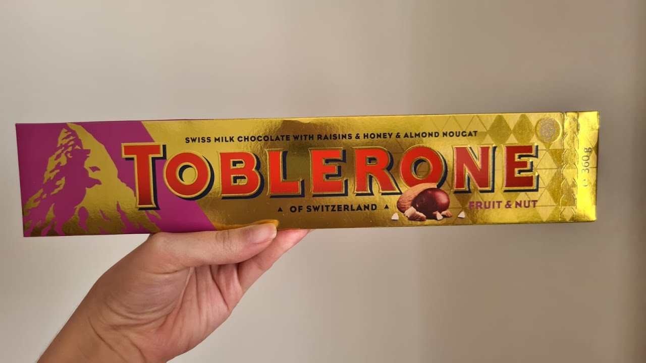 Eating Giant Toblerone Chocolate - YouTube