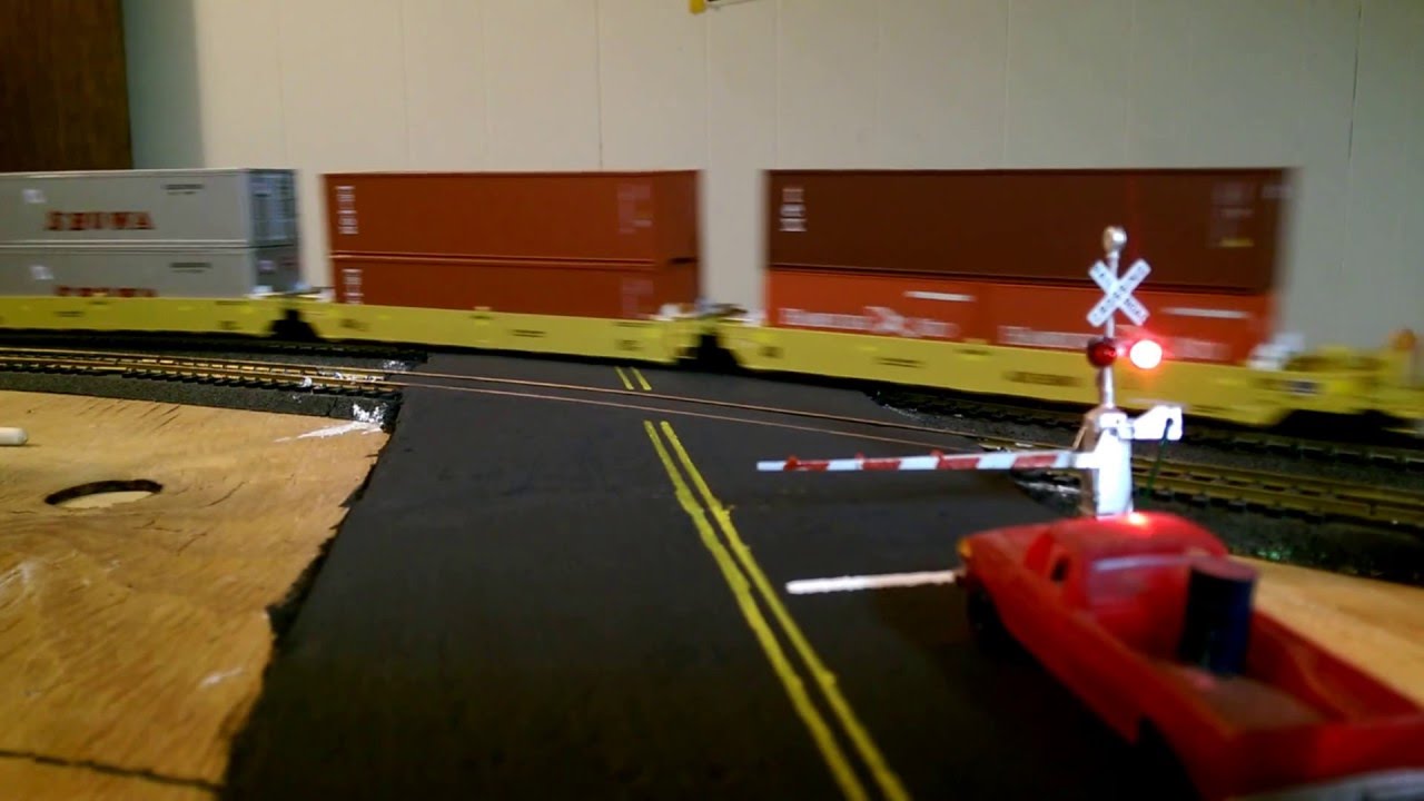 HO scale flashing crossbucks with gates - YouTube