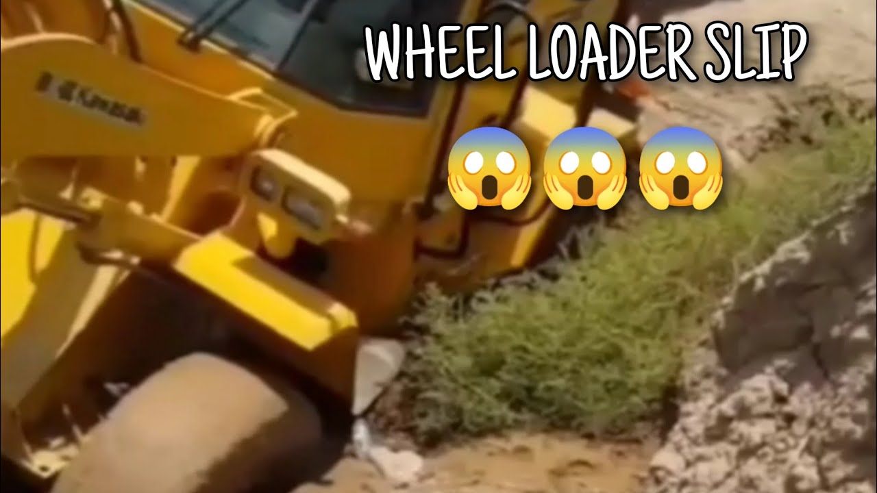 FAIL WHEEL LOADER SLIP IN TO MUD - YouTube