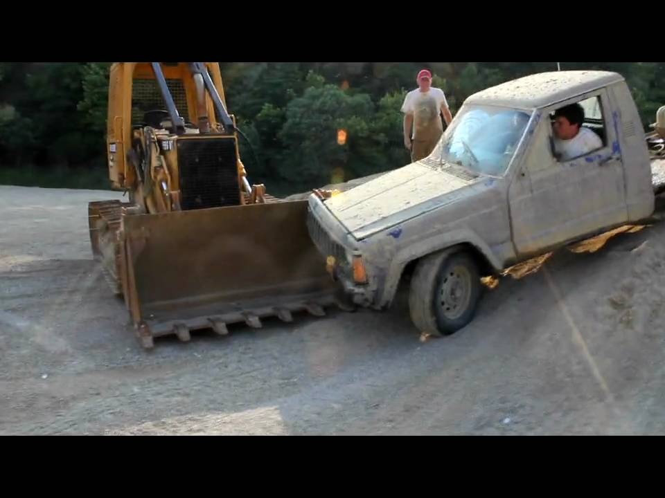 gene wrecking the jeep comanche into a bull dozer over a rock mound ...