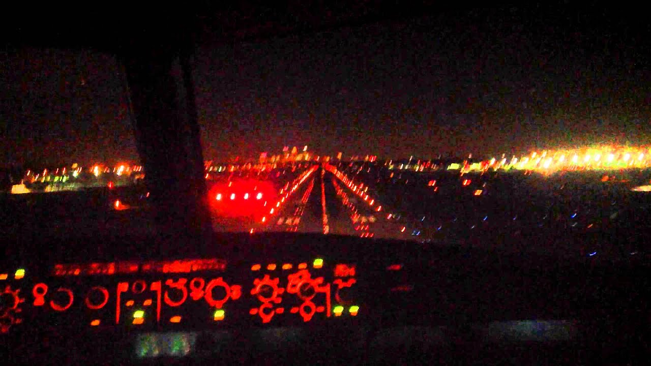 Flight deck view landing MSP at night A320 - YouTube