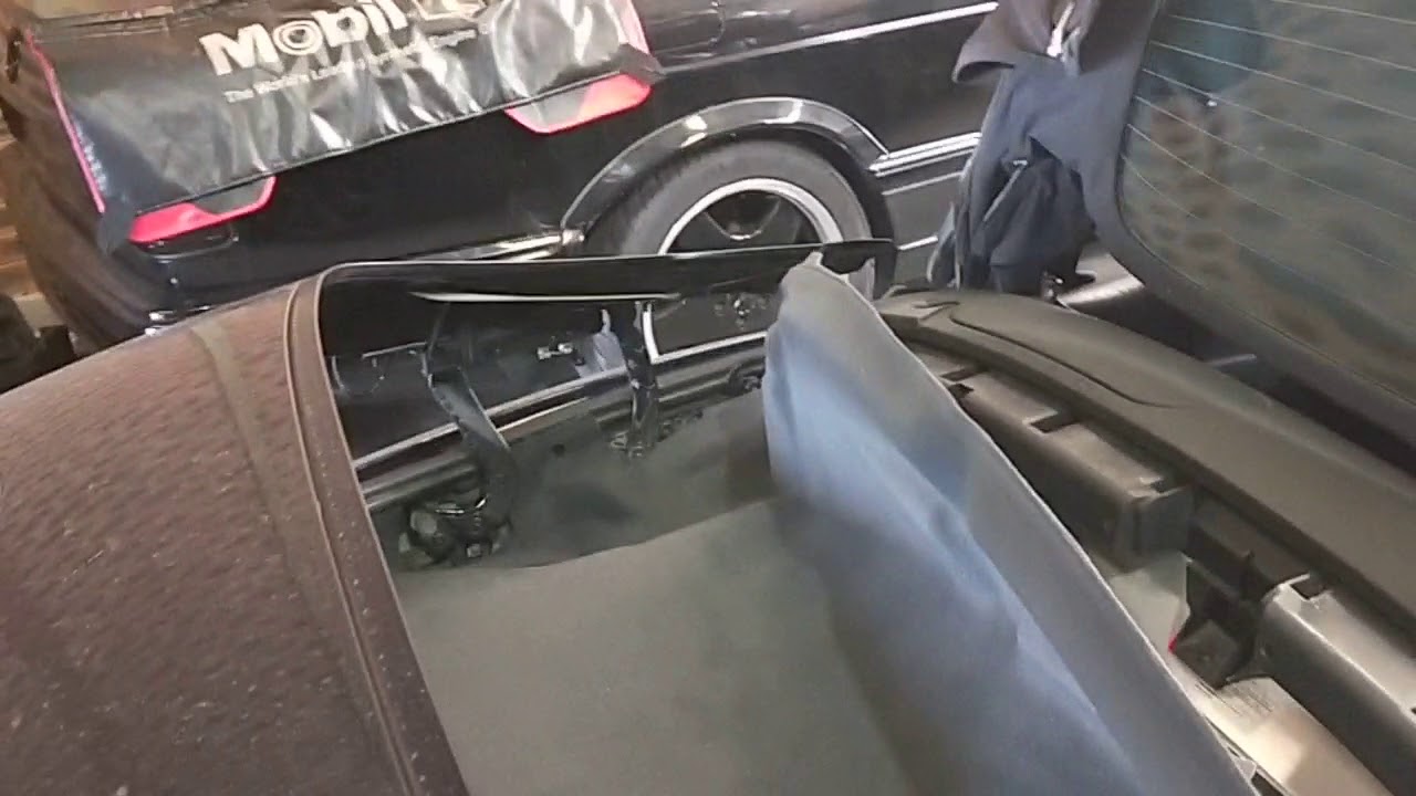 Porsche 996 Cabrio side roof flap installation part1 - YouTube