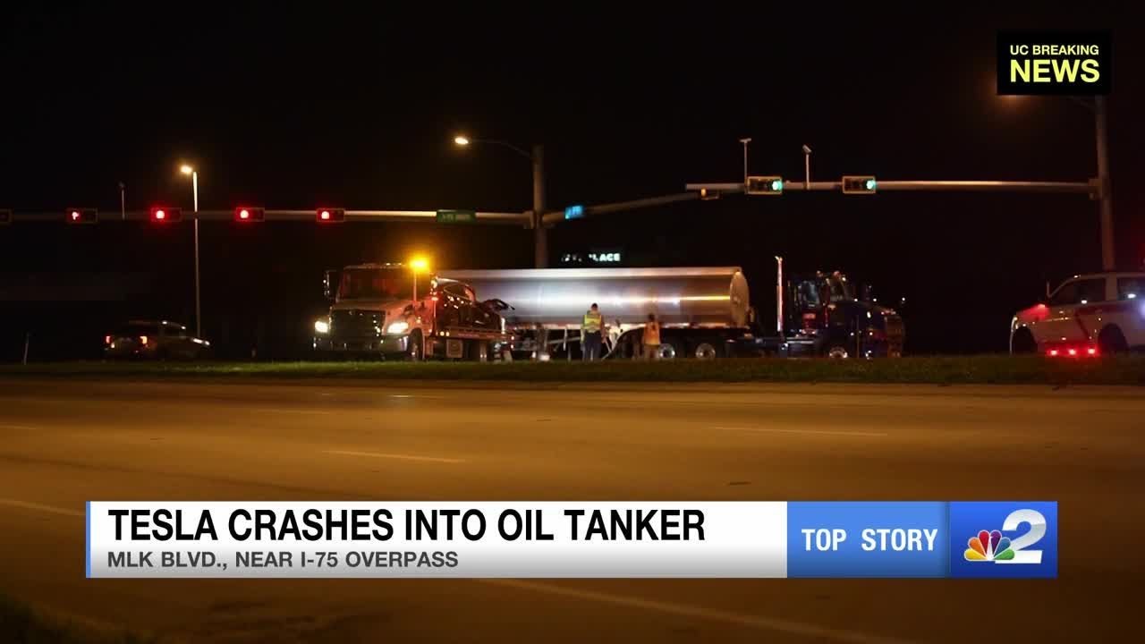 Tesla crashes into truck causing oil spill in Fort Myers - YouTube