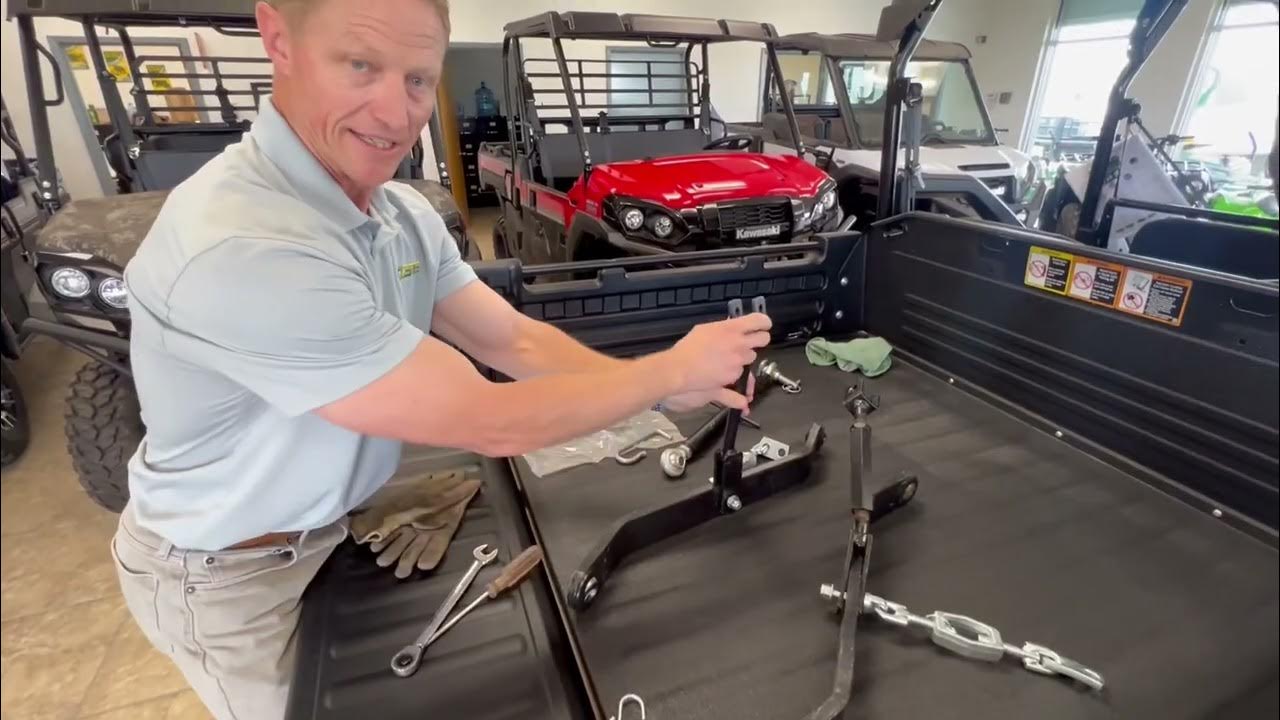 Assemble a three-point-hitch for a John Deere 1025R tractor-loader ...