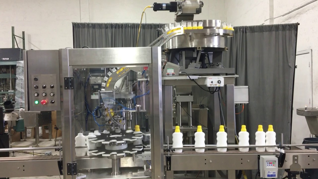 Single head chuck capper machine with vibratory type cap feeder model ...