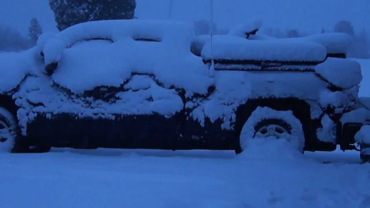 Overnight snowfall accumulation in MI's U.P. on a Conservation Officer ...
