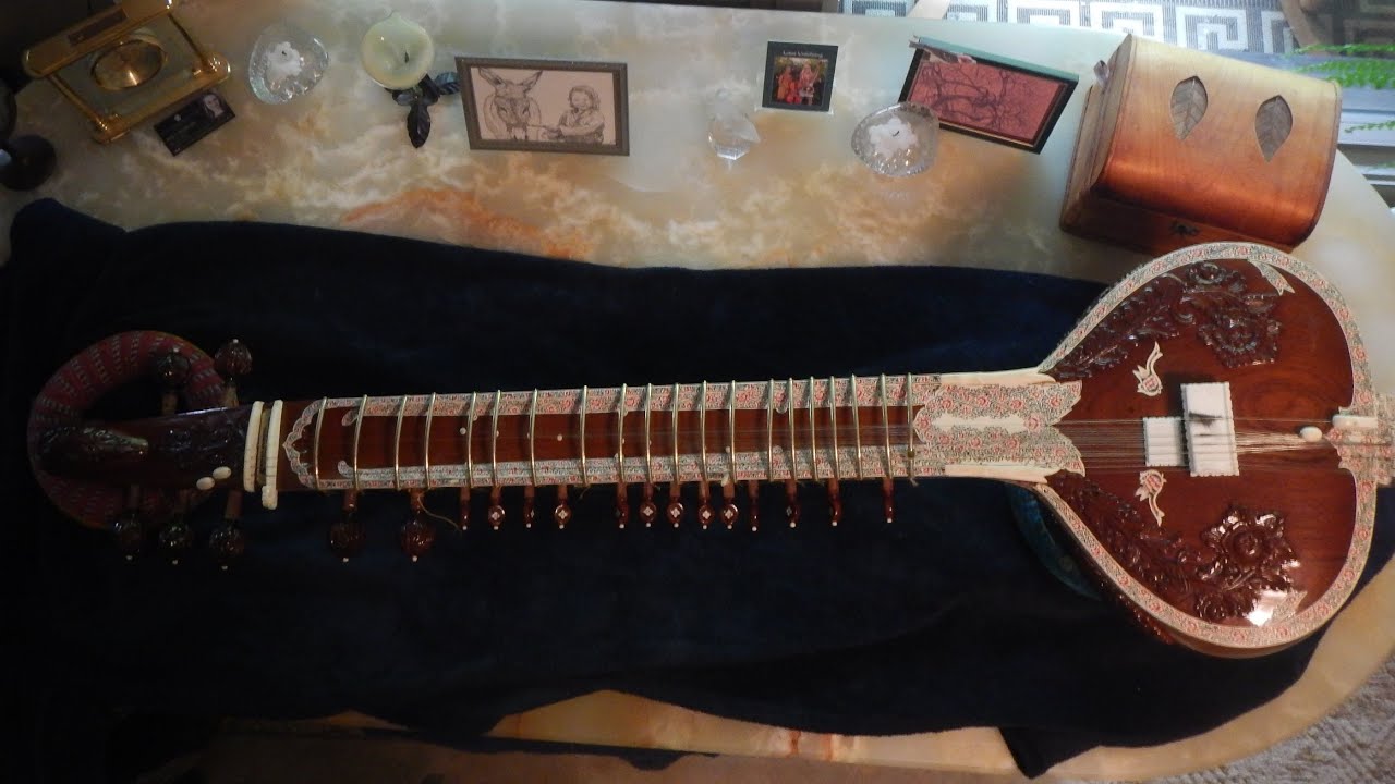 changing a sitar string (tuning and settling it in)... - YouTube