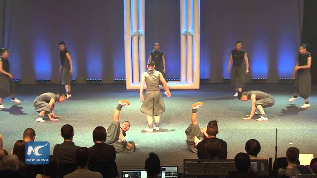 RAW: Jackie Chan's kungfu dance troupe performs in Latvia - YouTube