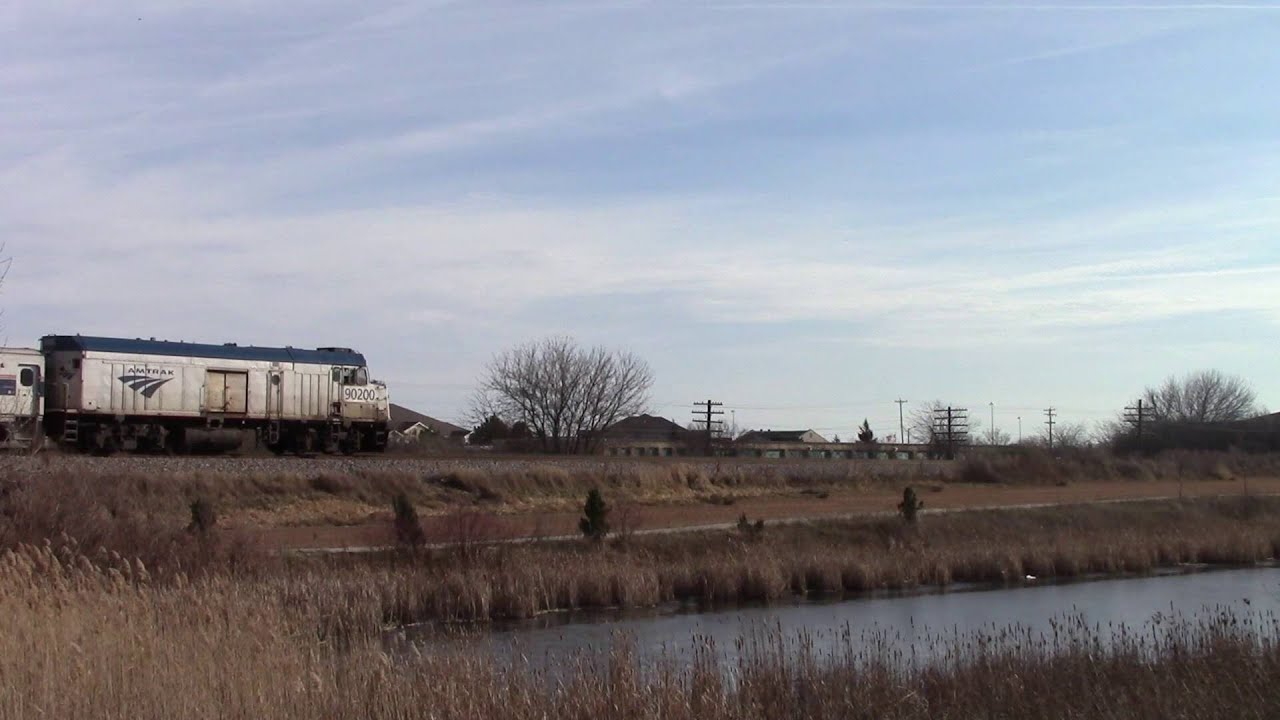 NS 8101 meets Amtrak 336 in Sturtevant, WI - YouTube
