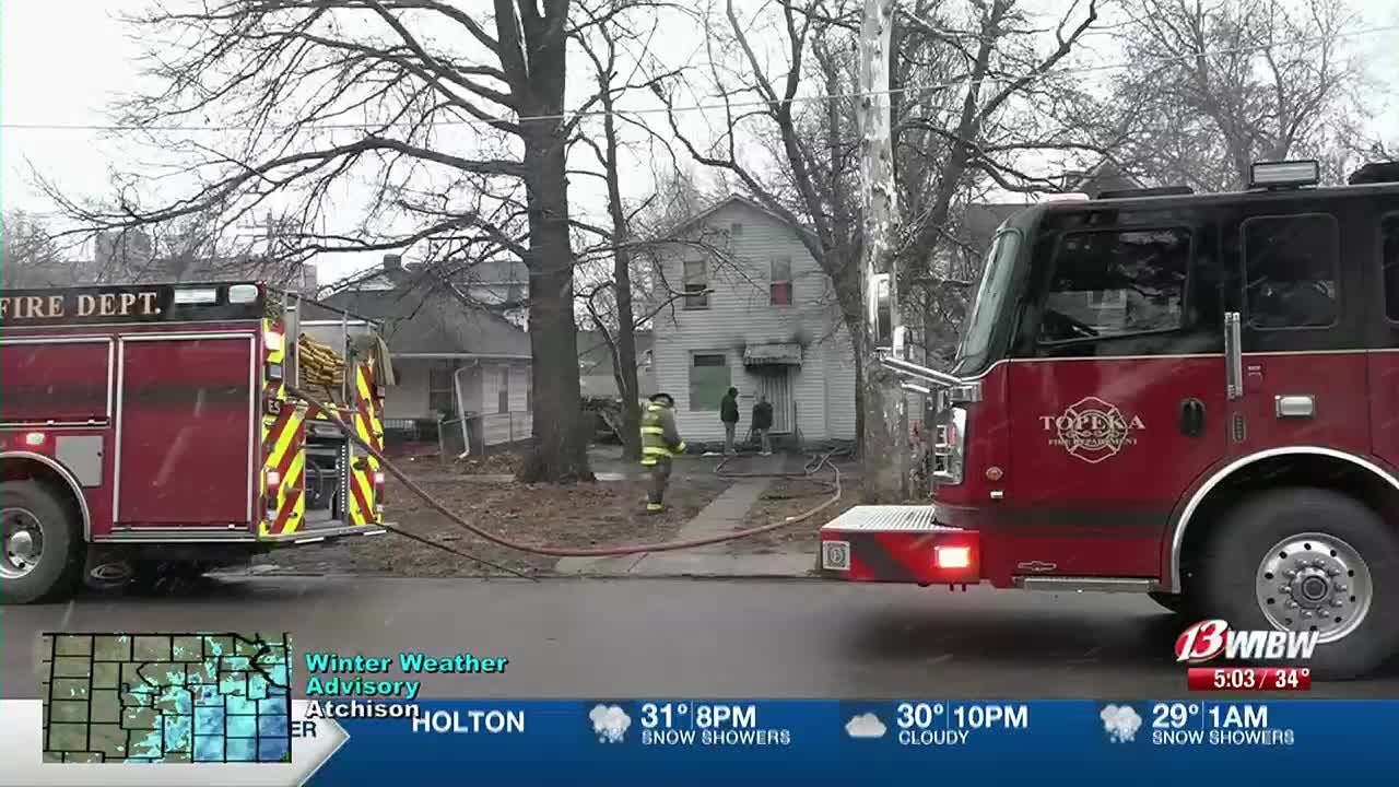 Crews extinguish house fire Tuesday in central Topeka - YouTube