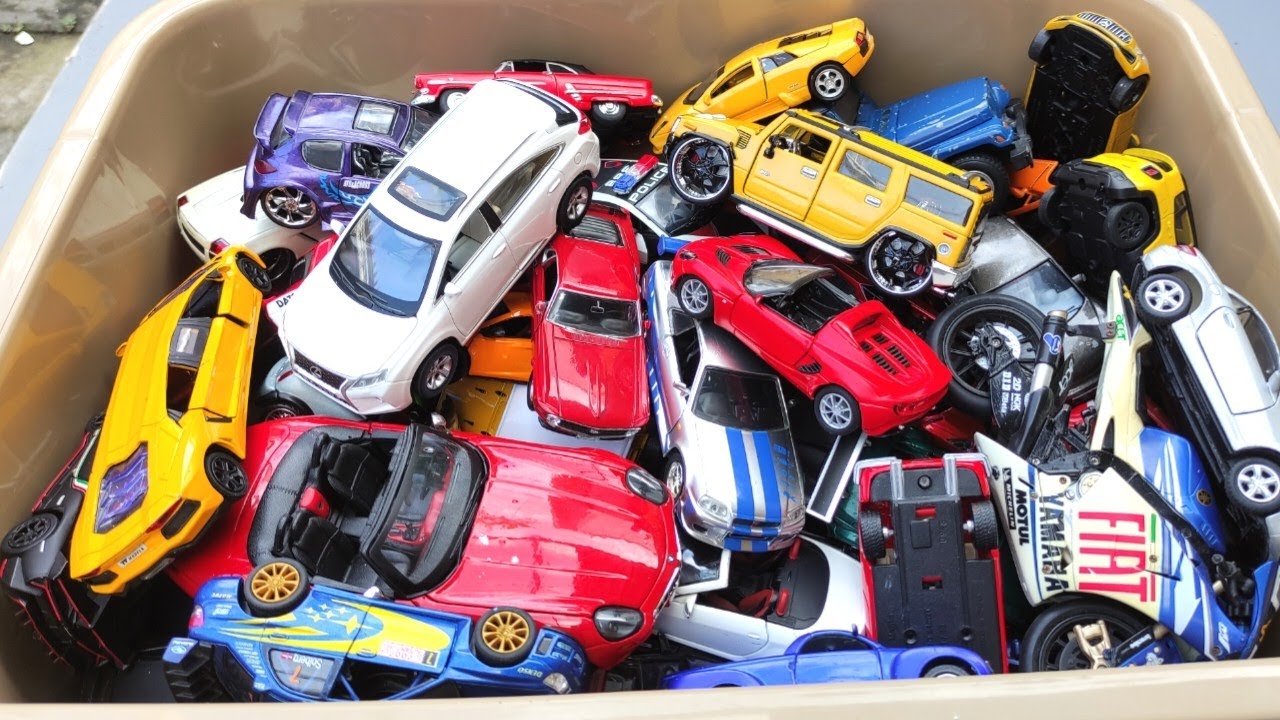 Die cast Metal Scale Model, Box full various diecast cars and show in ...