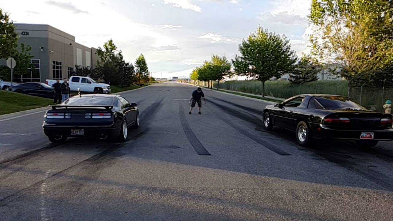 Slow camaro vs fast Nissan - YouTube
