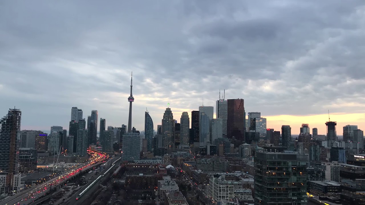 Time lapse of clouds and a sunset over Toronto - YouTube