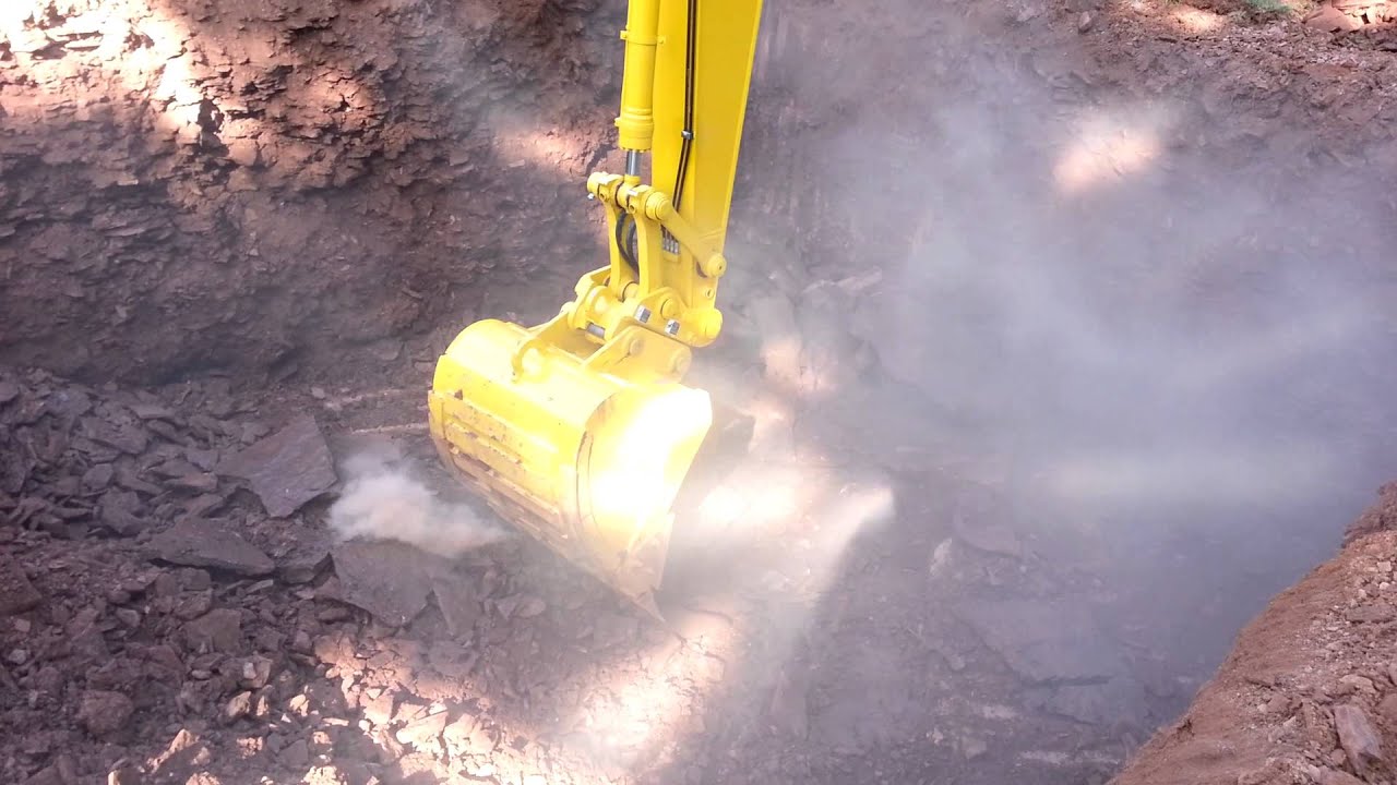Komatsu pc 160 ripping thru hard shale - YouTube