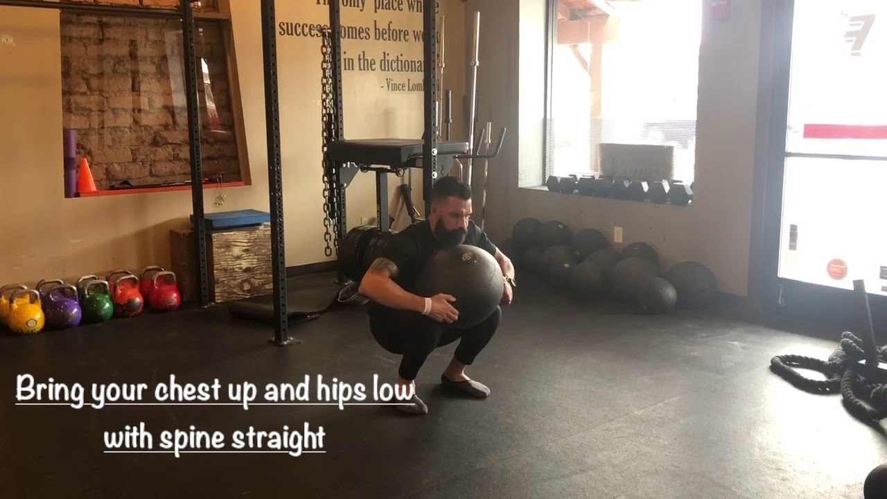 How To Do: Strongman Shouldering (slam ball) - YouTube