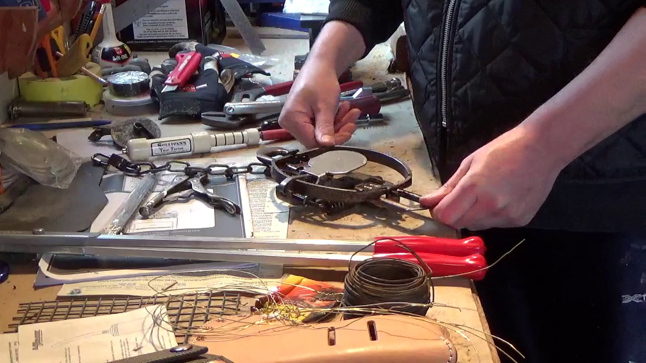 Paws-I-Trip Pan Tension Kit installation for Coilspring traps - YouTube